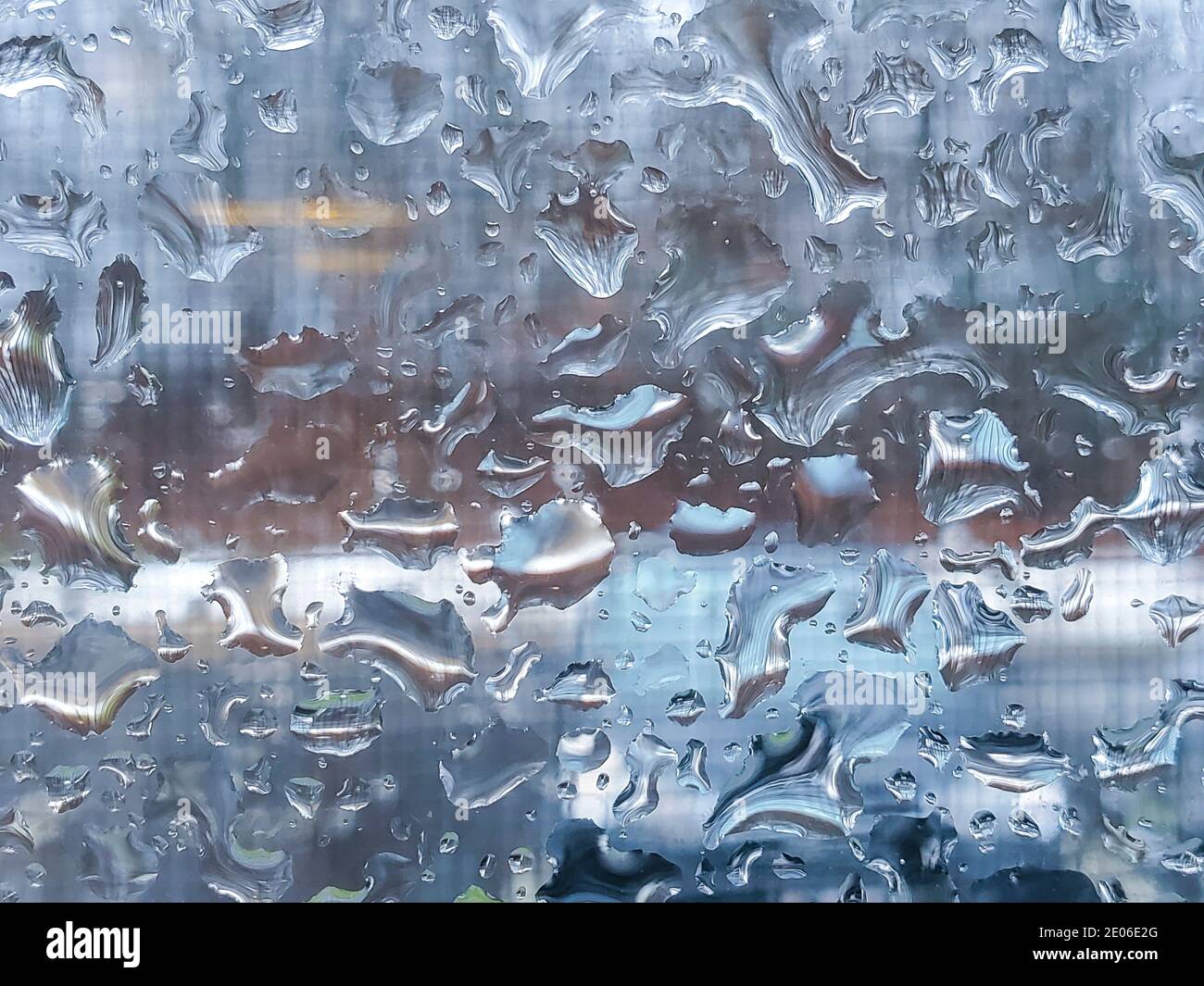 Raindrops flowing on window hi-res stock photography and images - Alamy