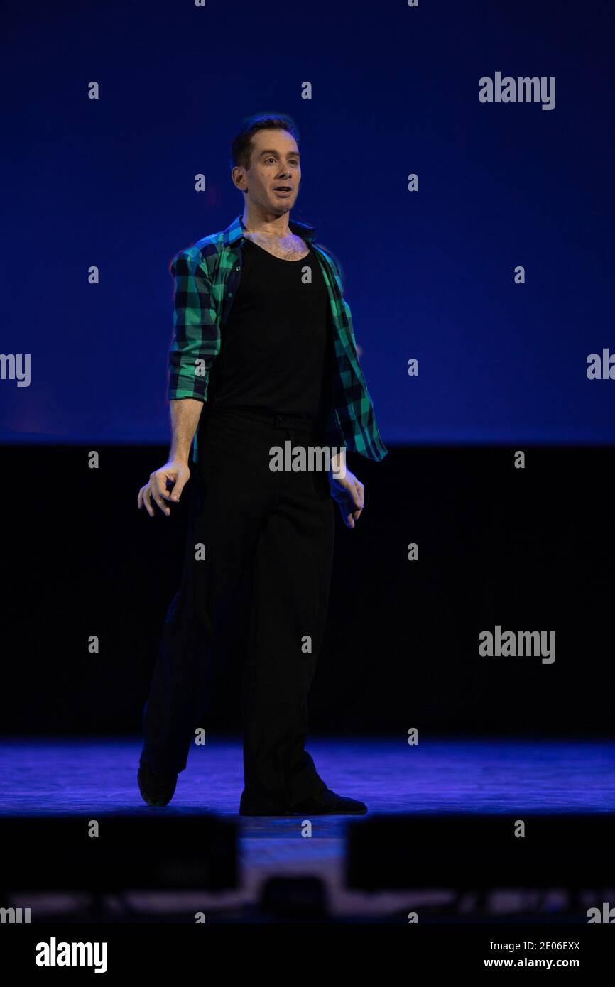 Actor dancer young man performs in the theater on stage in a dance ...