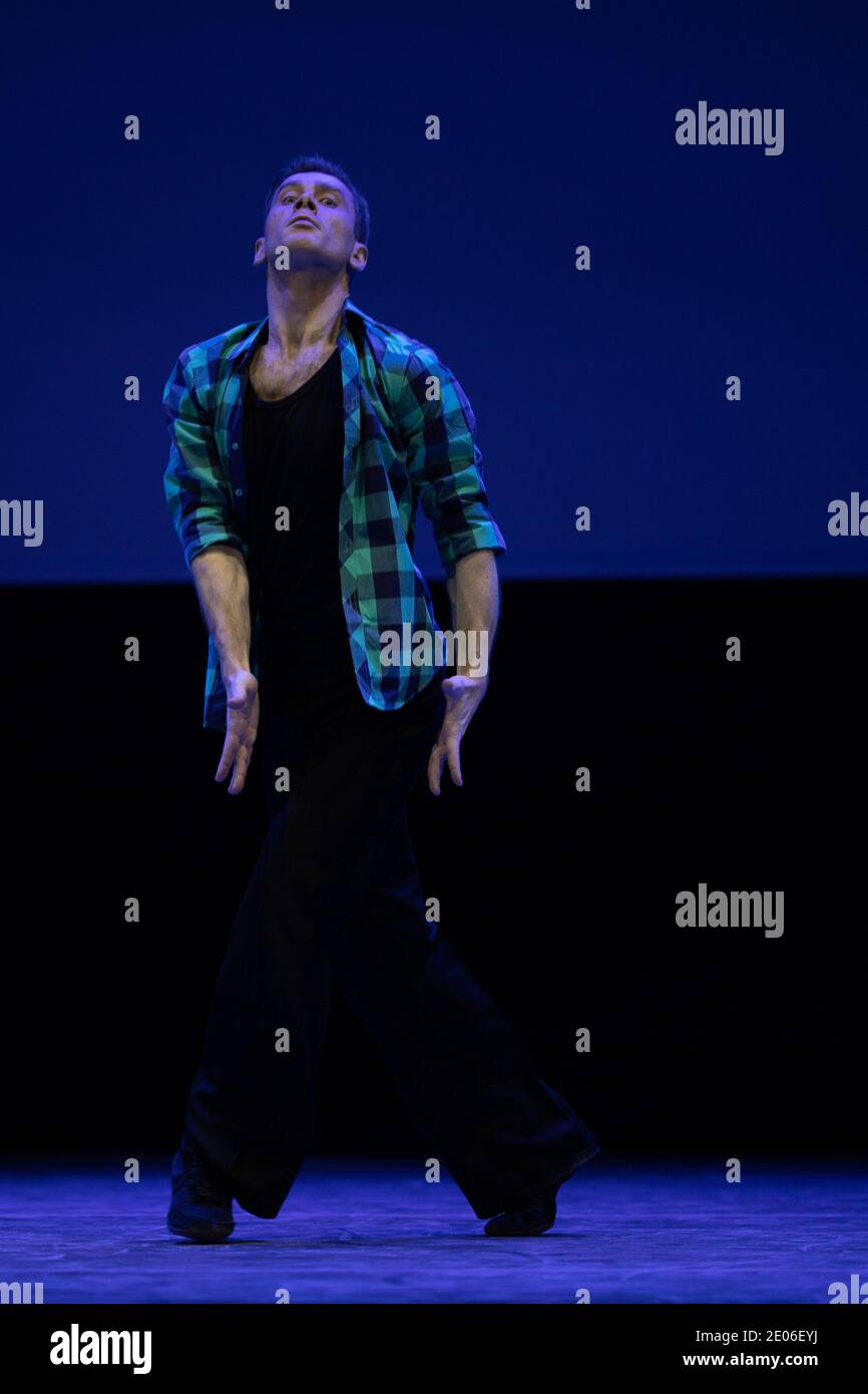 Actor dancer young man performs in the theater on stage in a dance ...