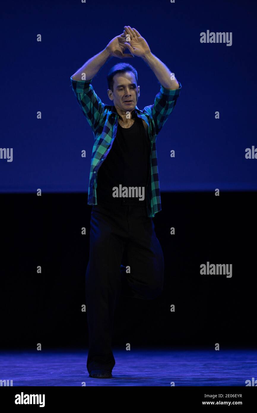 Actor dancer young man performs in the theater on stage in a dance ...