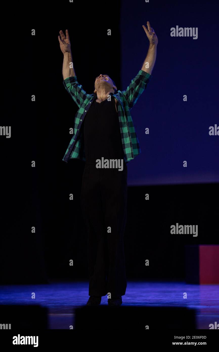 Actor dancer young man performs in the theater on stage in a dance ...