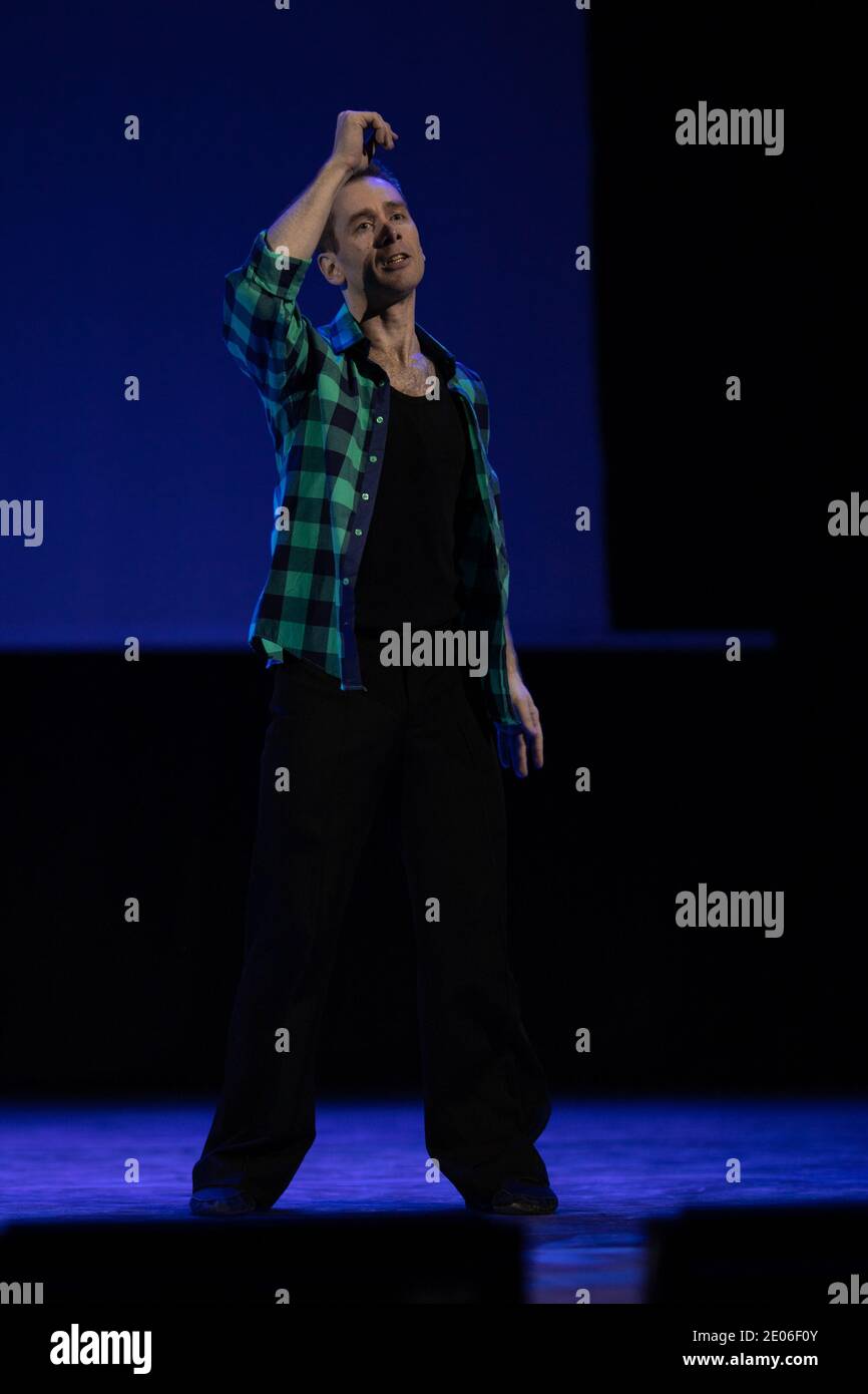 Actor dancer young man performs in the theater on stage in a dance ...