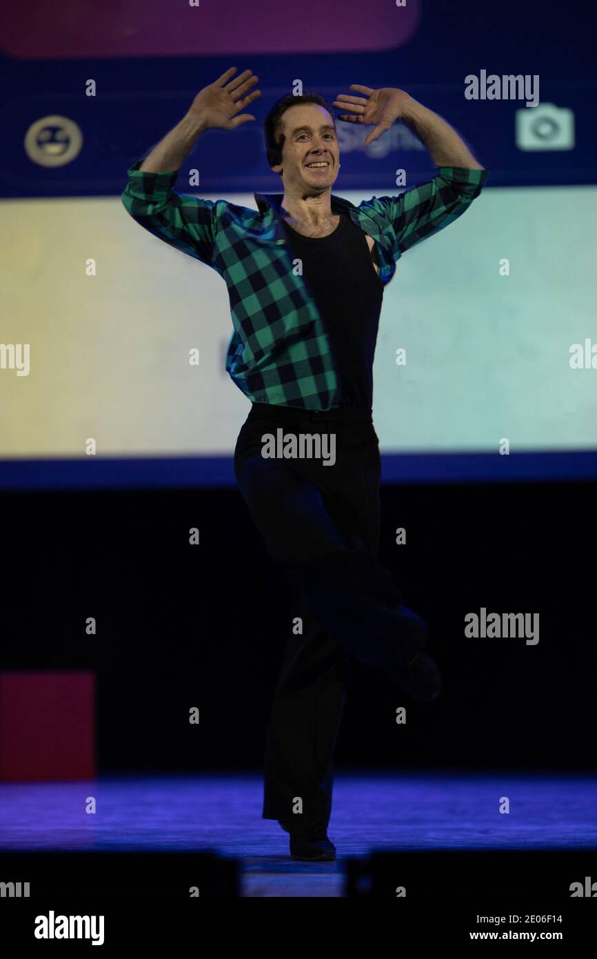 Actor dancer young man performs in the theater on stage in a dance ...