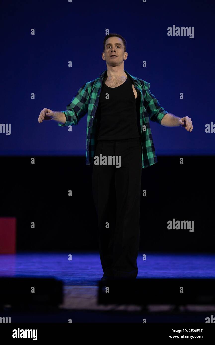 Actor dancer young man performs in the theater on stage in a dance ...