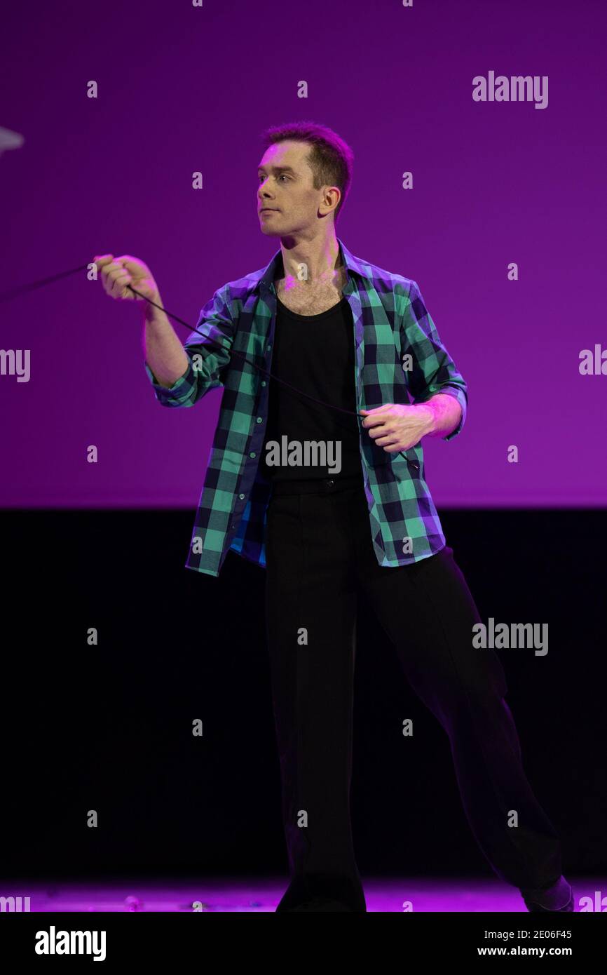 Actor dancer young man performs in the theater on stage in a dance ...