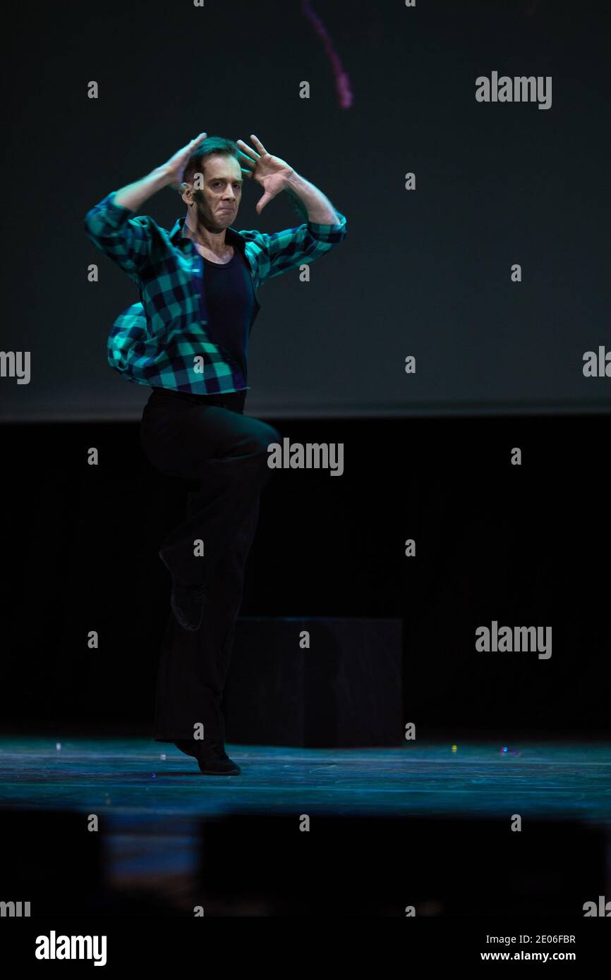 Actor dancer young man performs in the theater on stage in a dance ...