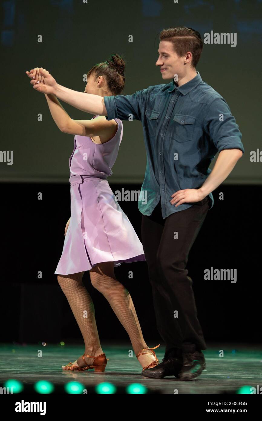 Team Actors dancers perform in the theater on stage in a retro musical ...