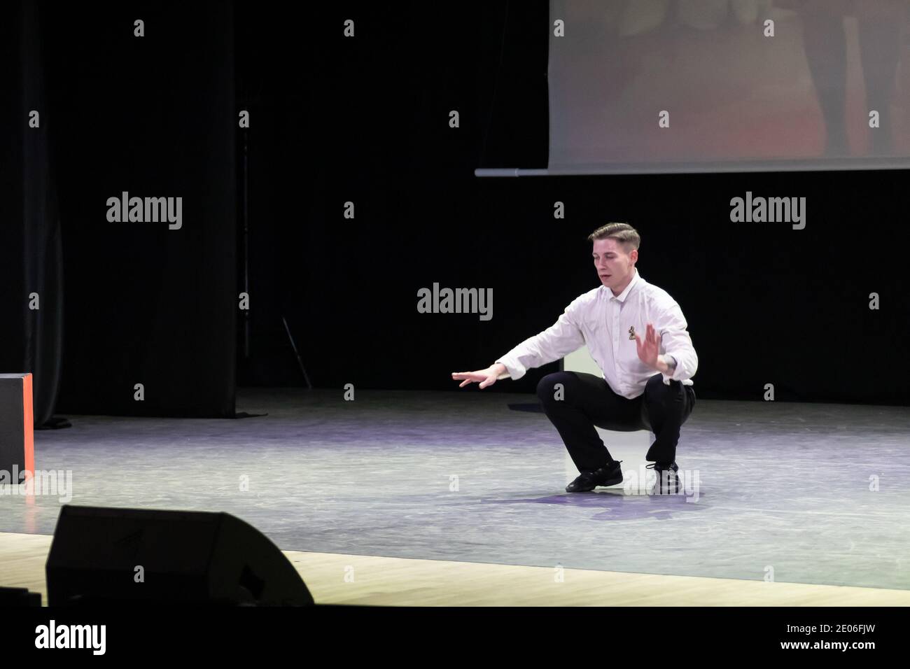 Actor dancer young man performs in the theater on stage in a dance ...