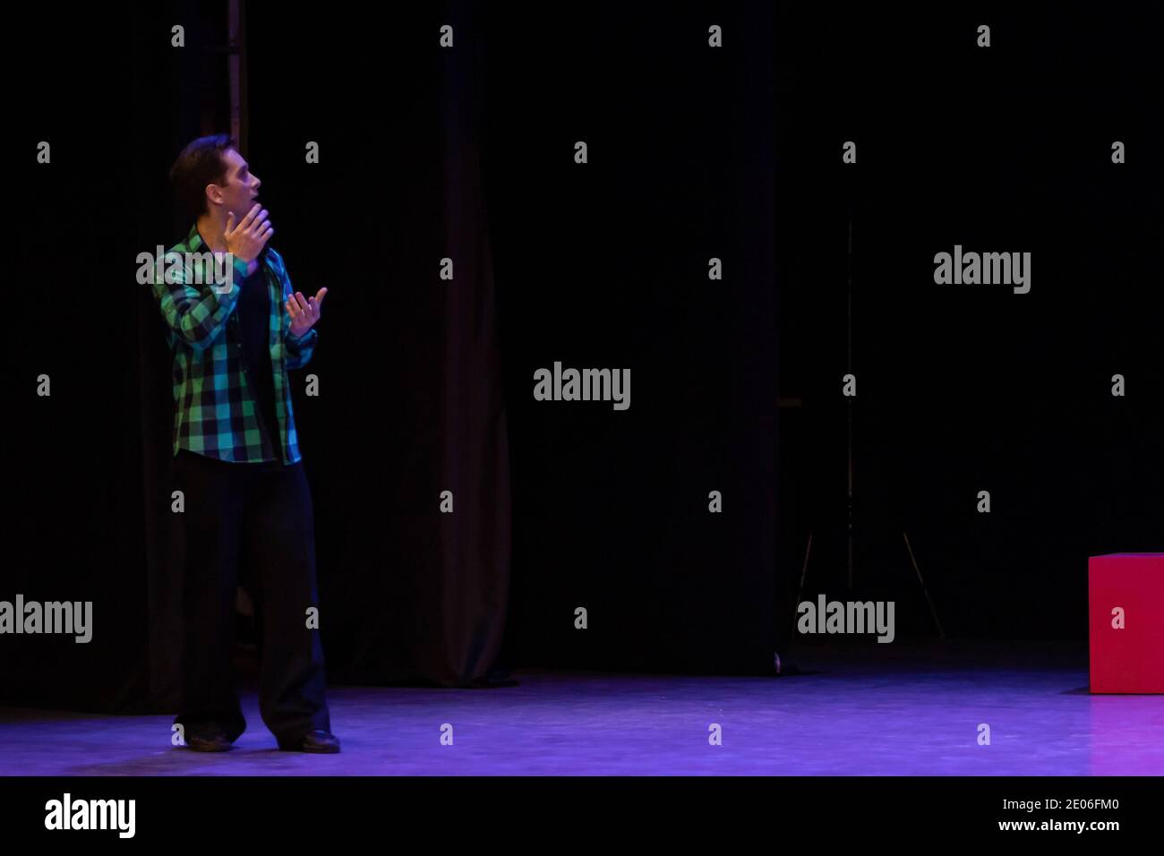 Actor dancer young man performs in the theater on stage in a dance ...