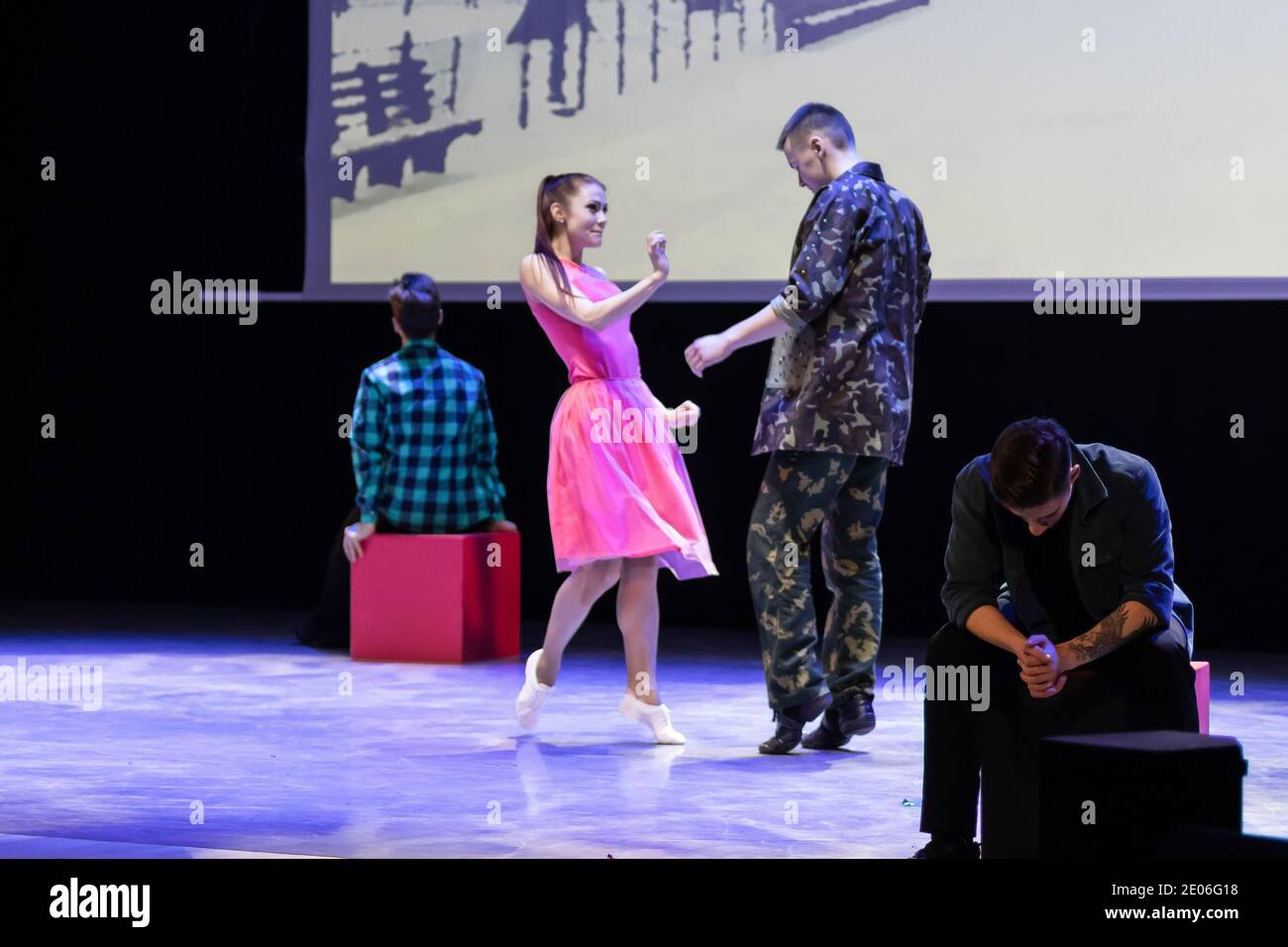 Team Actors dancers perform in the theater on stage in a retro musical ...