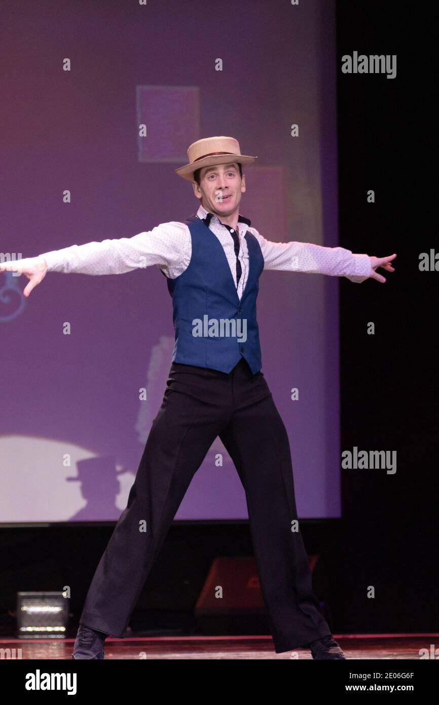 Actor dancer young man performs in the theater on stage in a dance ...