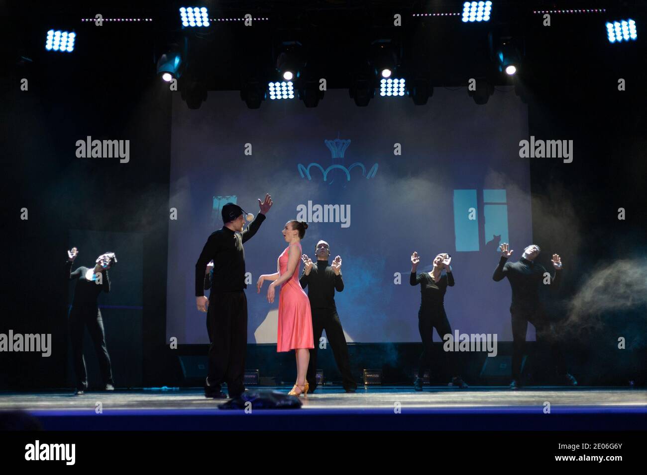 Team Actors dancers perform in the theater on stage in a retro musical ...