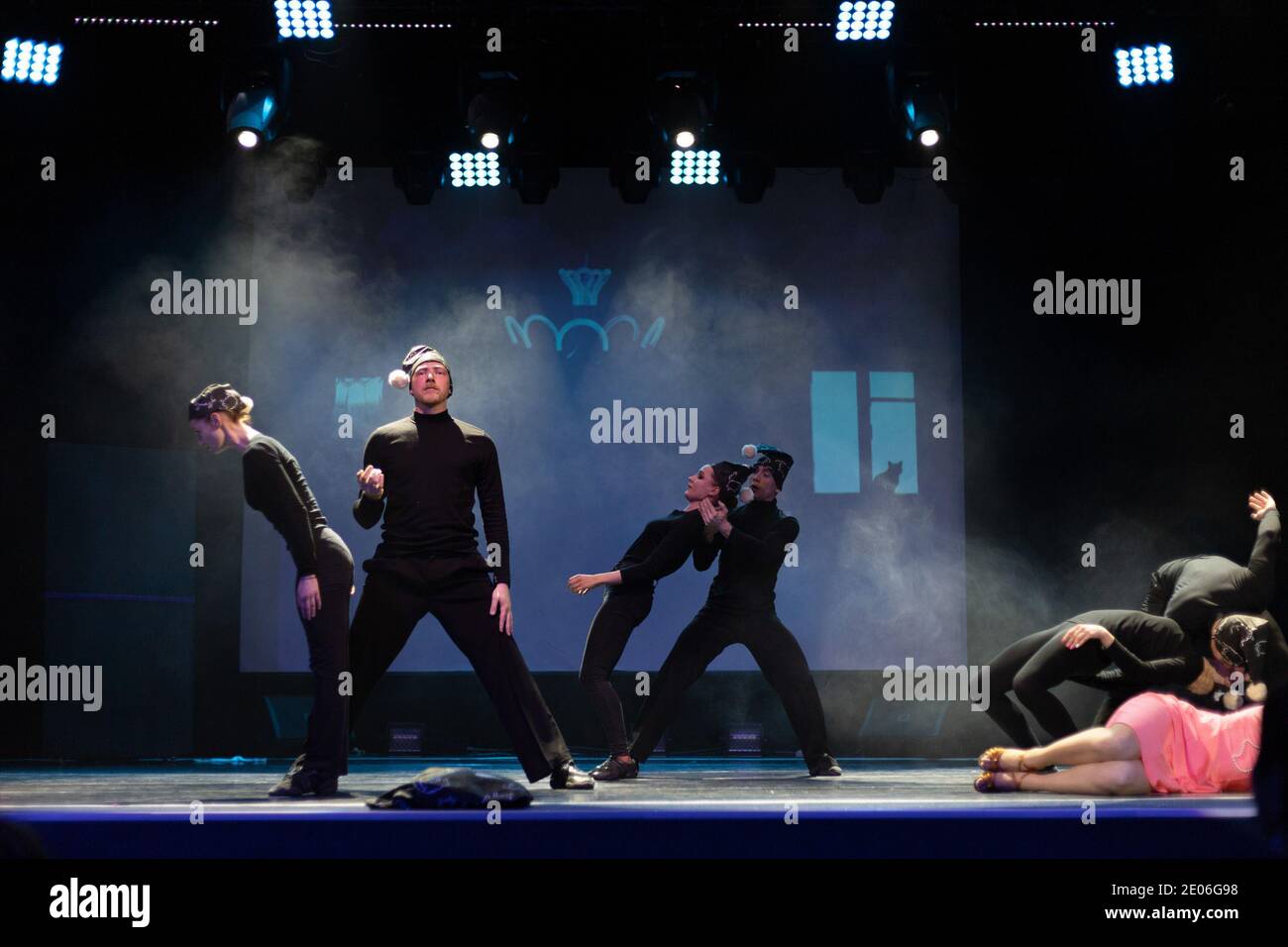 Team Actors dancers perform in the theater on stage in a retro musical ...