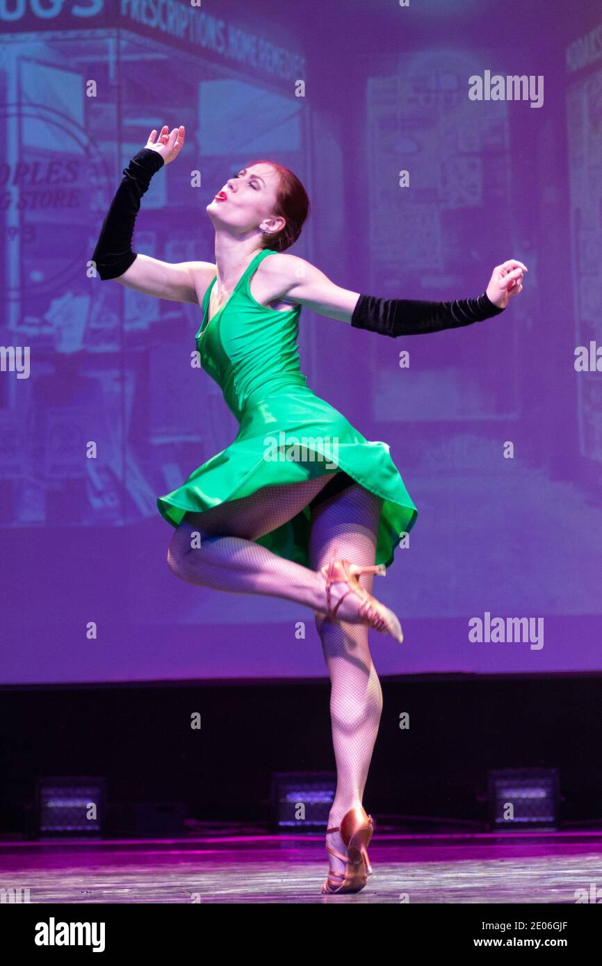 Dancer actresses young woman performs on theatrical scene in the ...