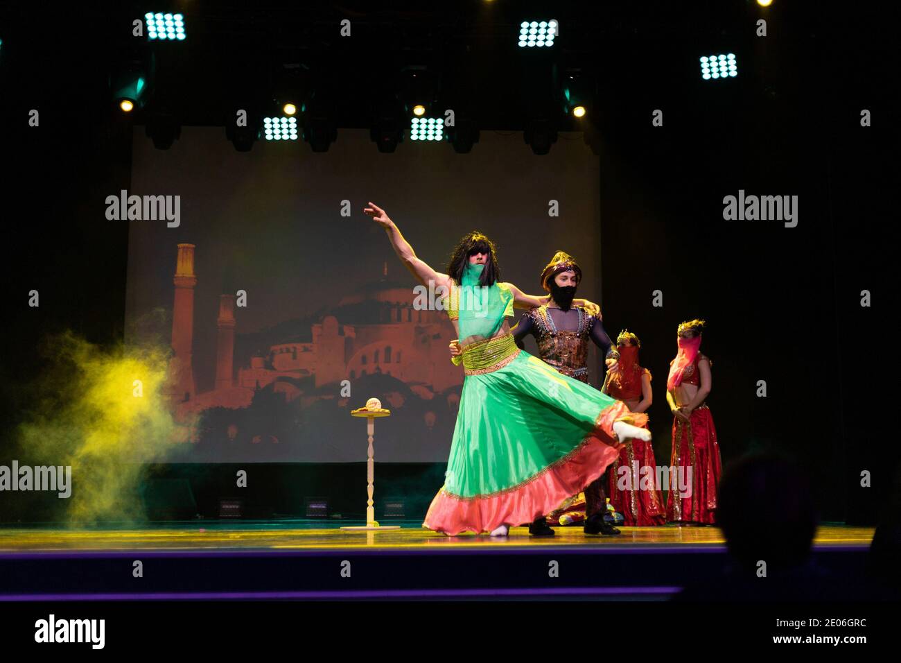 Dancers actors in Oriental Bellydance costumes perform in theater on ...