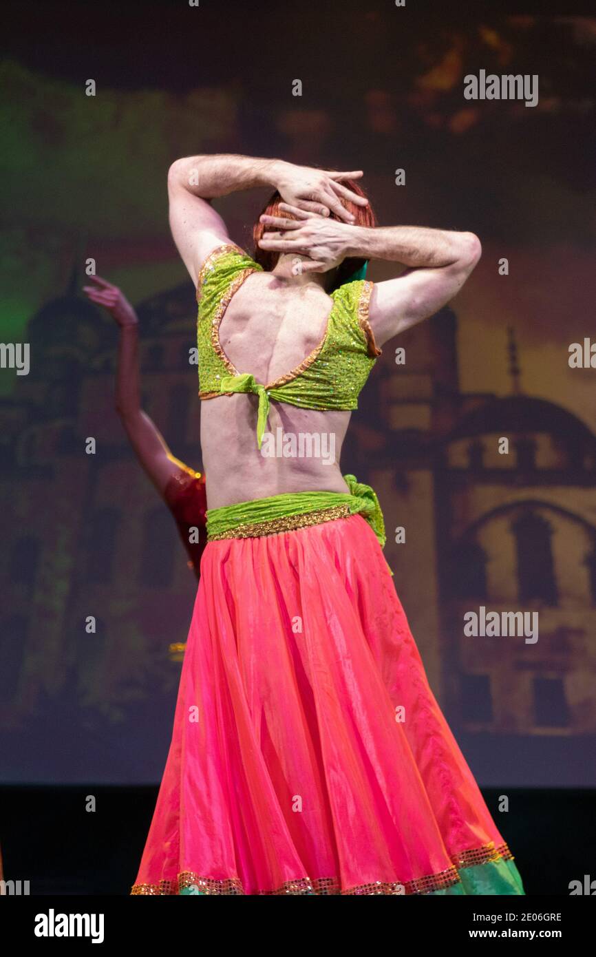 Dancers actors in Oriental Bellydance costumes perform in theater on ...