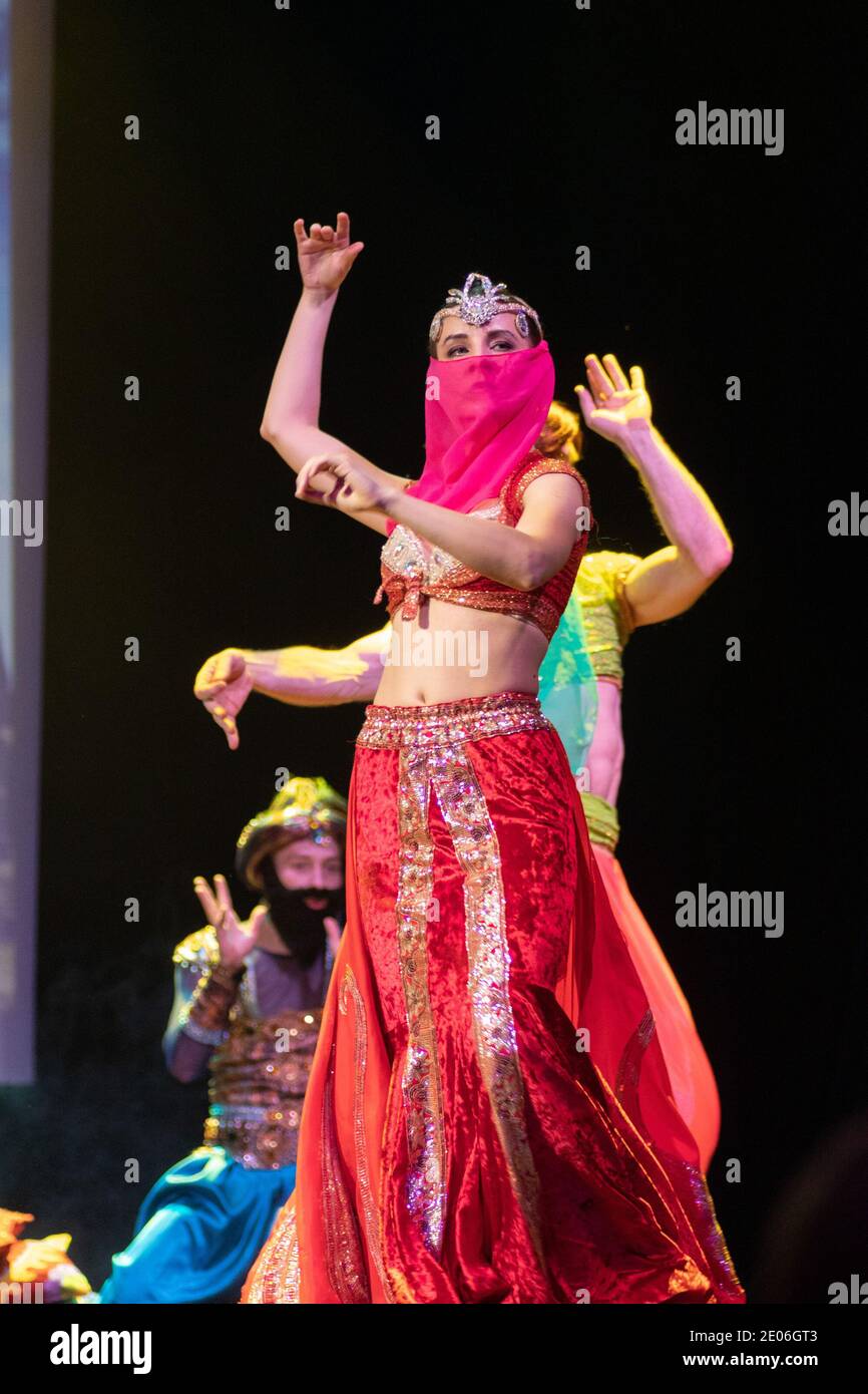 Dancers actors in Oriental Bellydance costumes perform in theater on ...