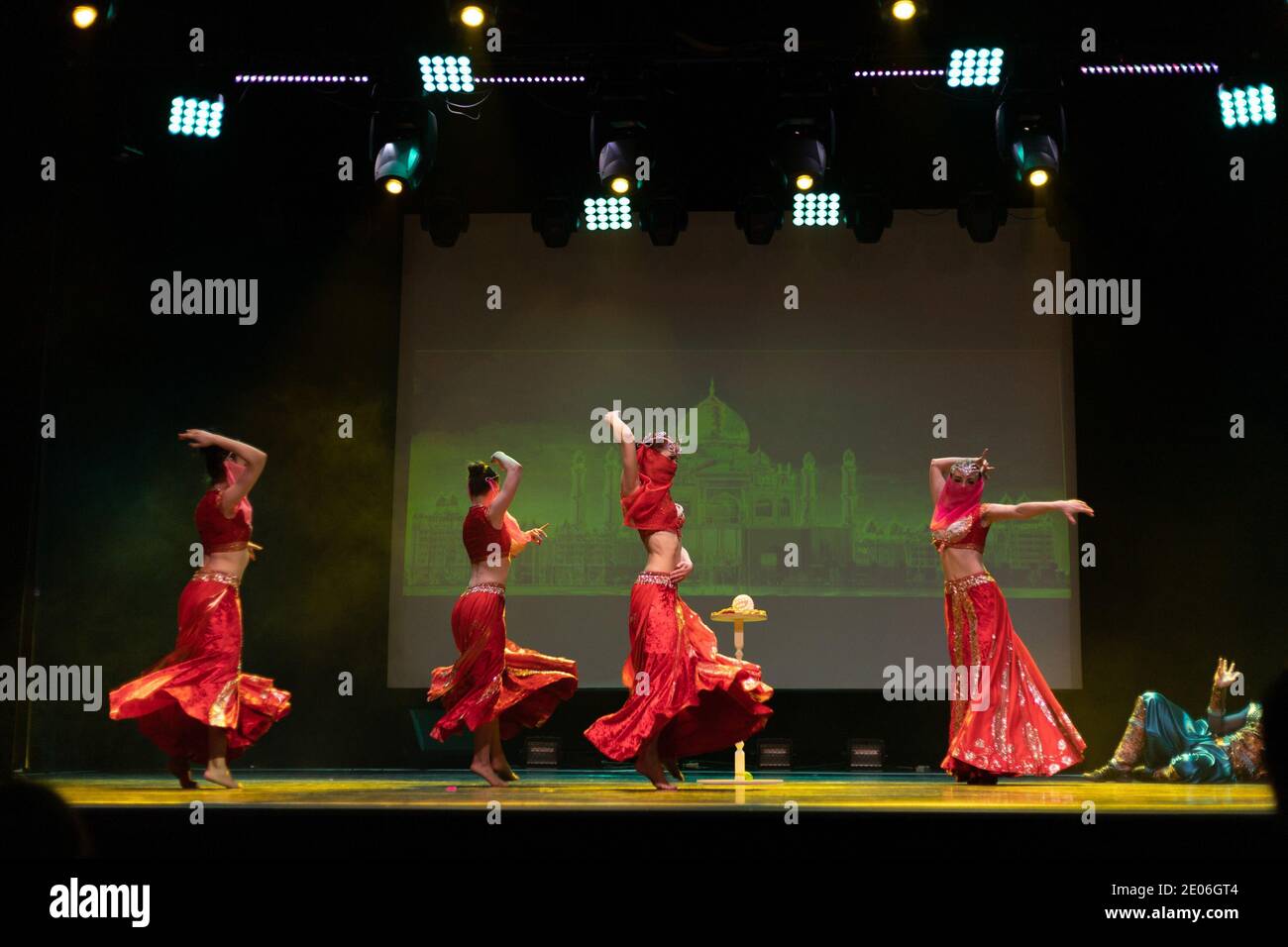 Dancers actors in Oriental Bellydance costumes perform in theater on ...