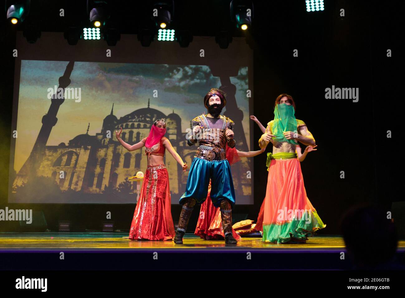 Dancers actors in Oriental Bellydance costumes perform in theater on ...