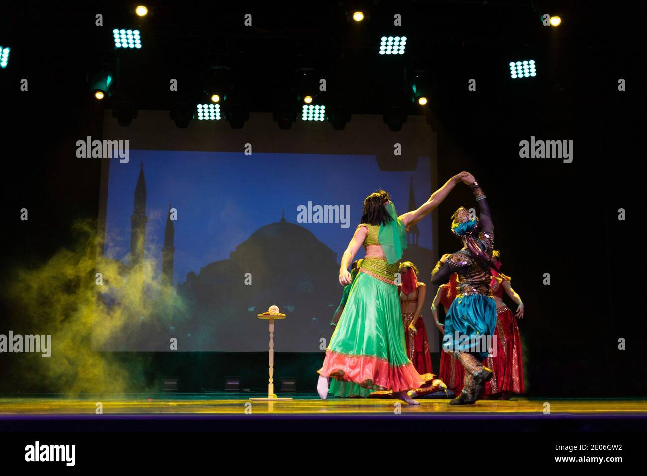 Dancers actors in Oriental Bellydance costumes perform in theater on ...