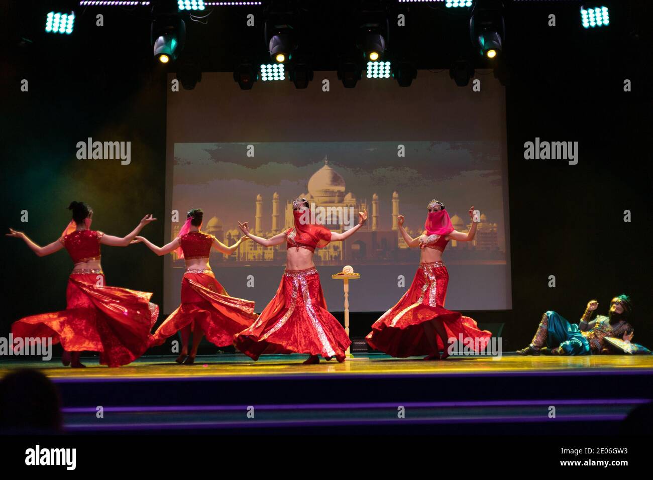 Dancers actors in Oriental Bellydance costumes perform in theater on ...