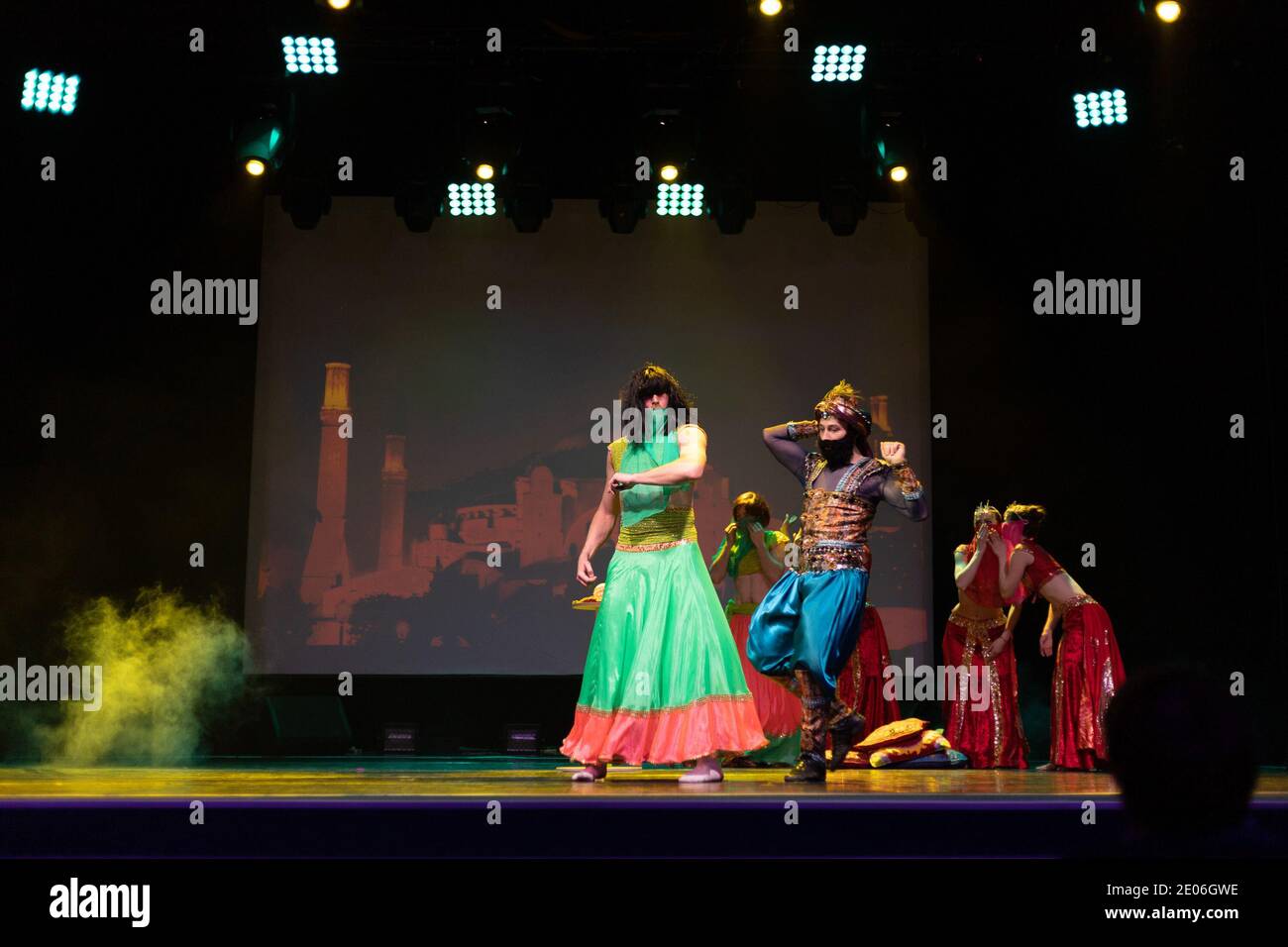 Dancers actors in Oriental Bellydance costumes perform in theater on ...