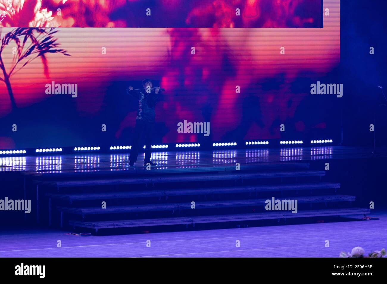 A team of musicians, singers and dancers in gypsy costumes singing and ...