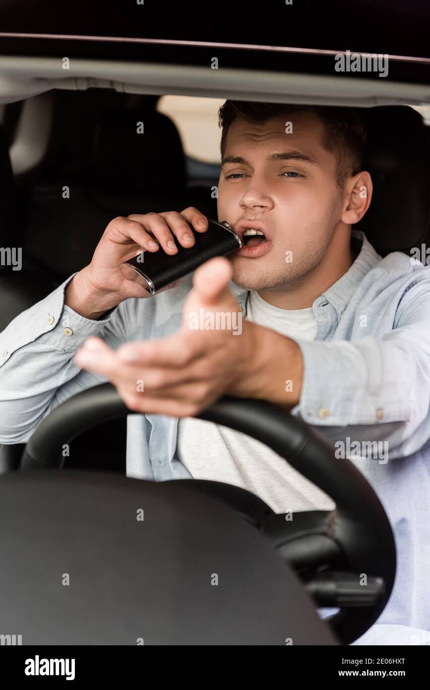 Man drinking flask hi-res stock photography and images - Alamy