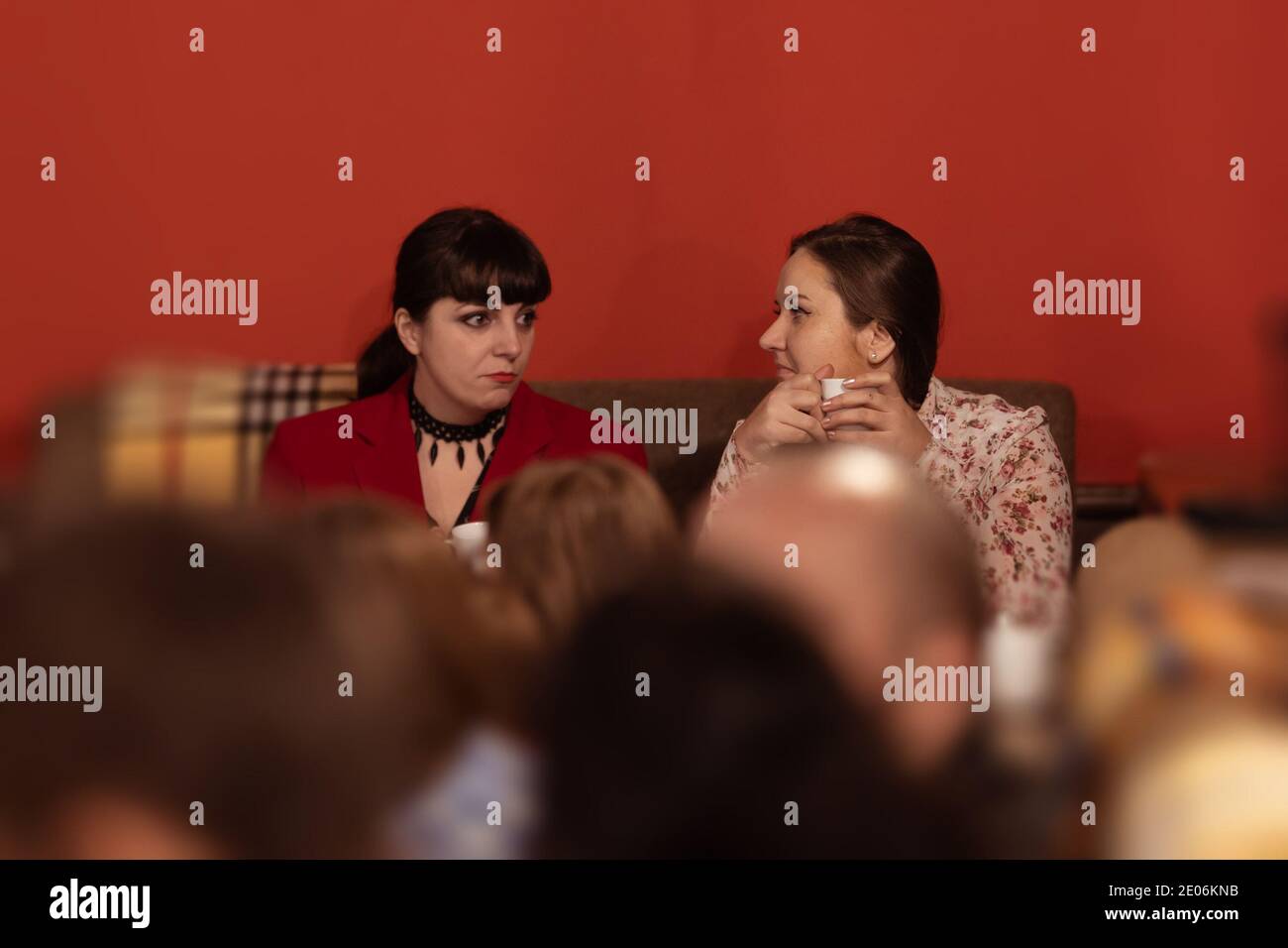Actors and actresses play a modern interactive performance show in a ...