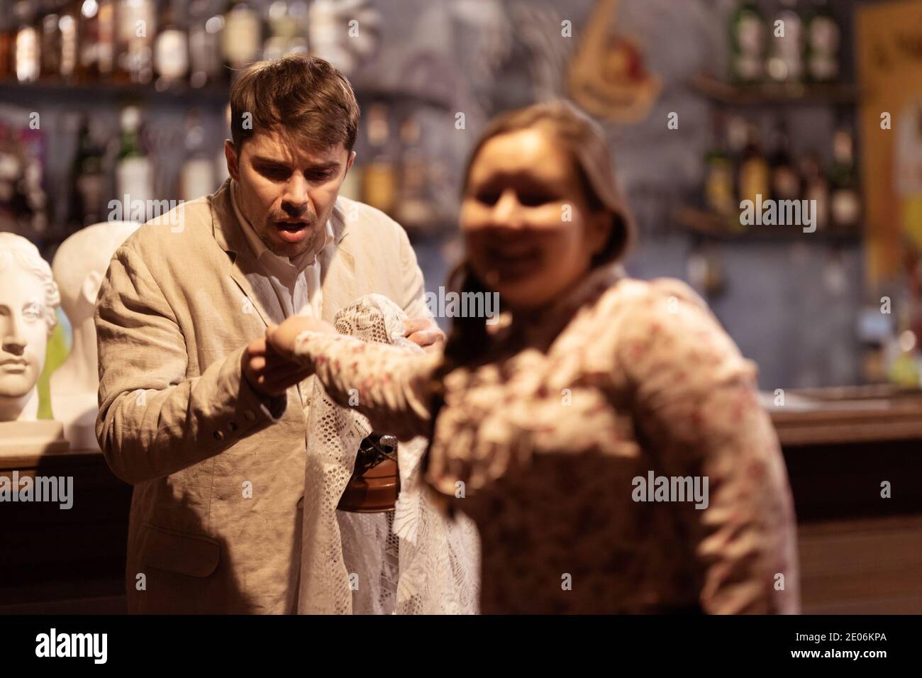 Actors and actresses play a modern interactive performance show in a ...