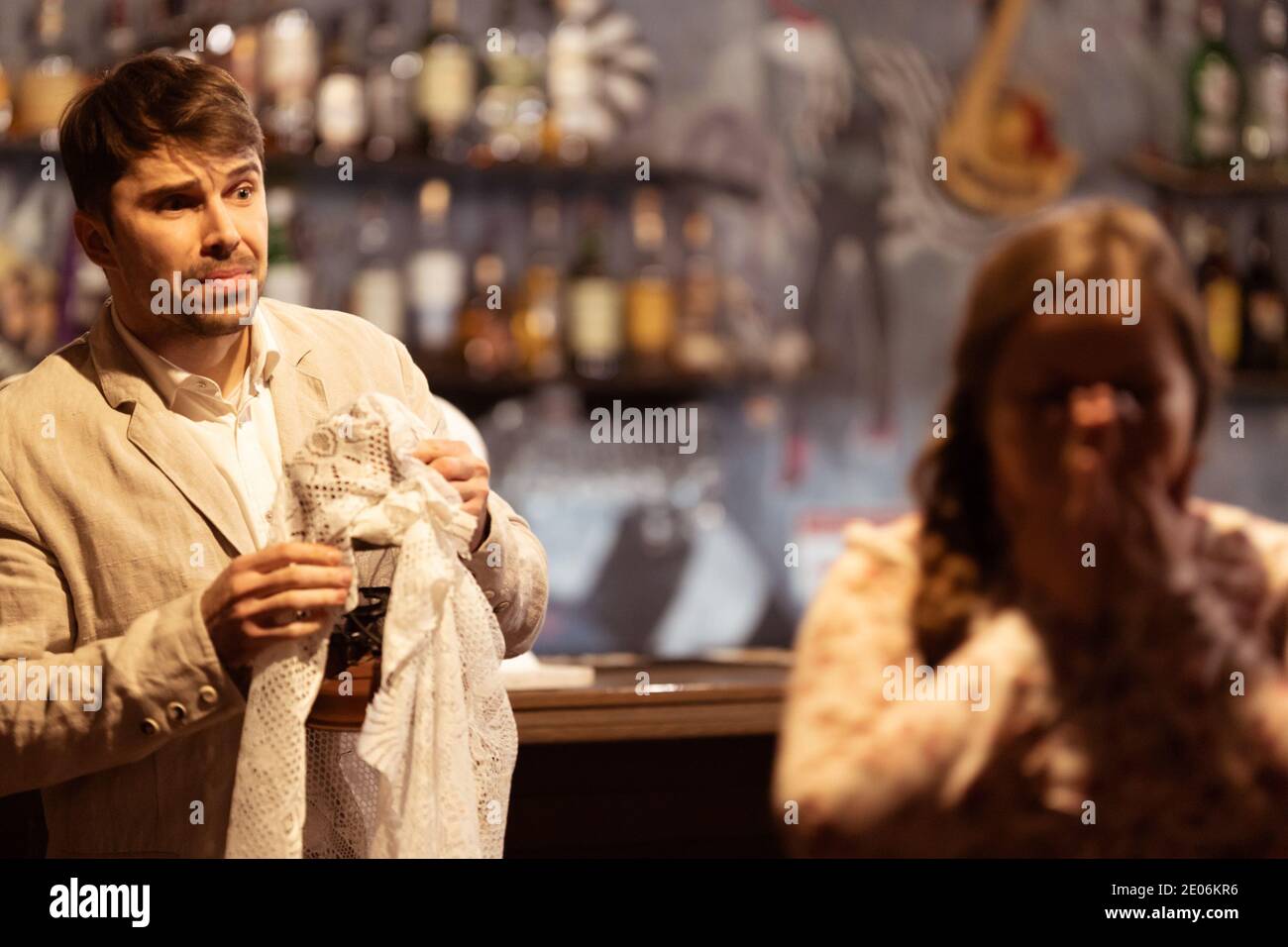 Actors and actresses play a modern interactive performance show in a ...
