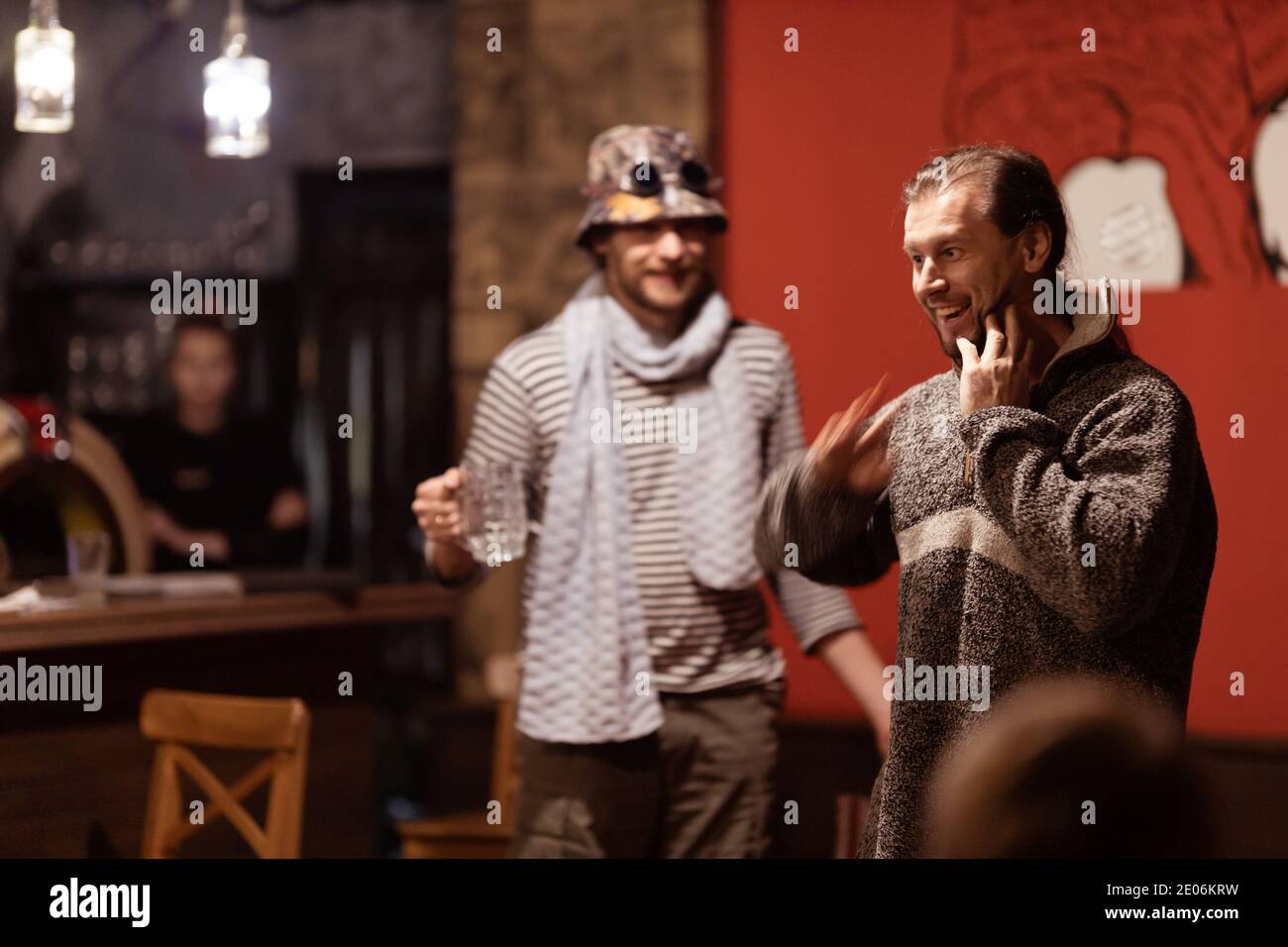 Actors and actresses play a modern interactive performance show in a ...