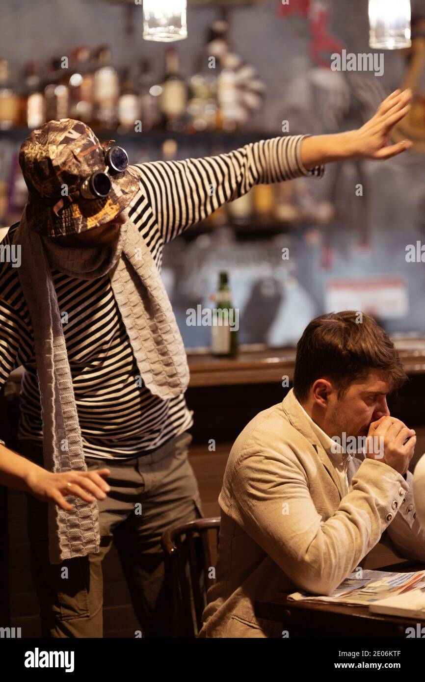 Actors and actresses play a modern interactive performance show in a ...