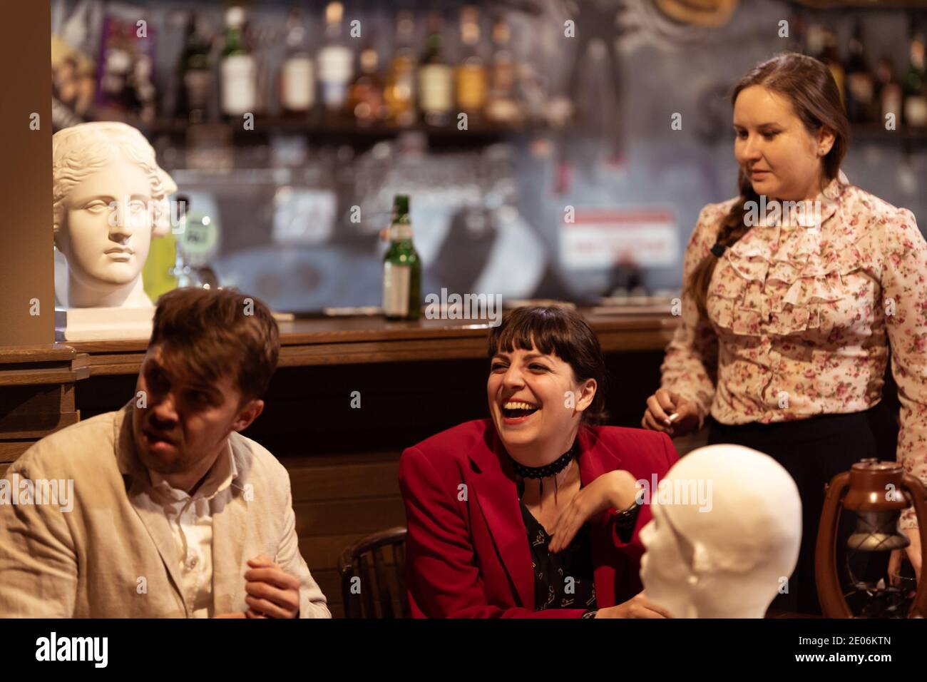 Actors and actresses play a modern interactive performance show in a ...