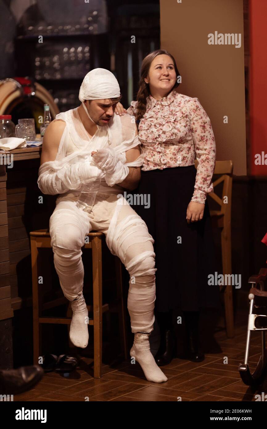 Actors and actresses play a modern interactive performance show in a ...