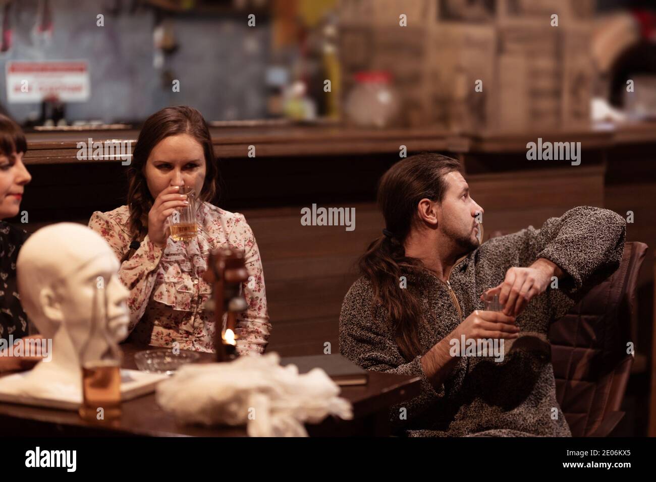 Actors and actresses play a modern interactive performance show in a ...