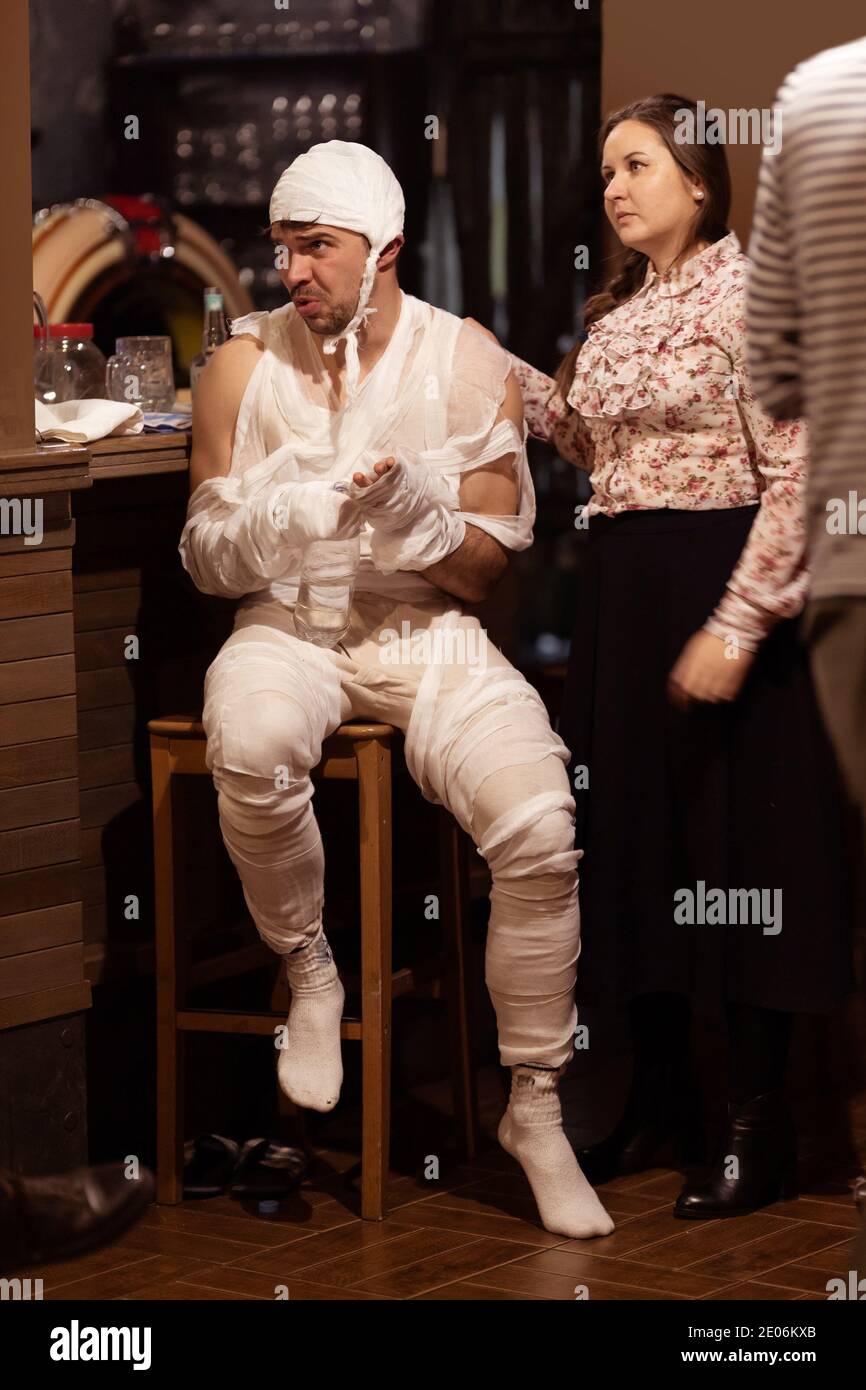 Actors and actresses play a modern interactive performance show in a ...