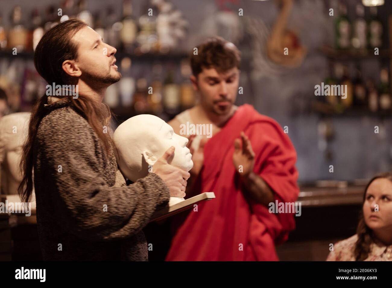 Actors and actresses play a modern interactive performance show in a ...