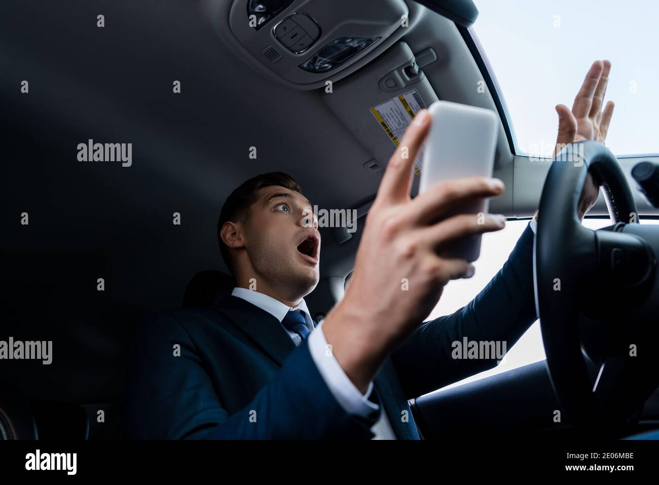 Scared man in car hi-res stock photography and images - Alamy