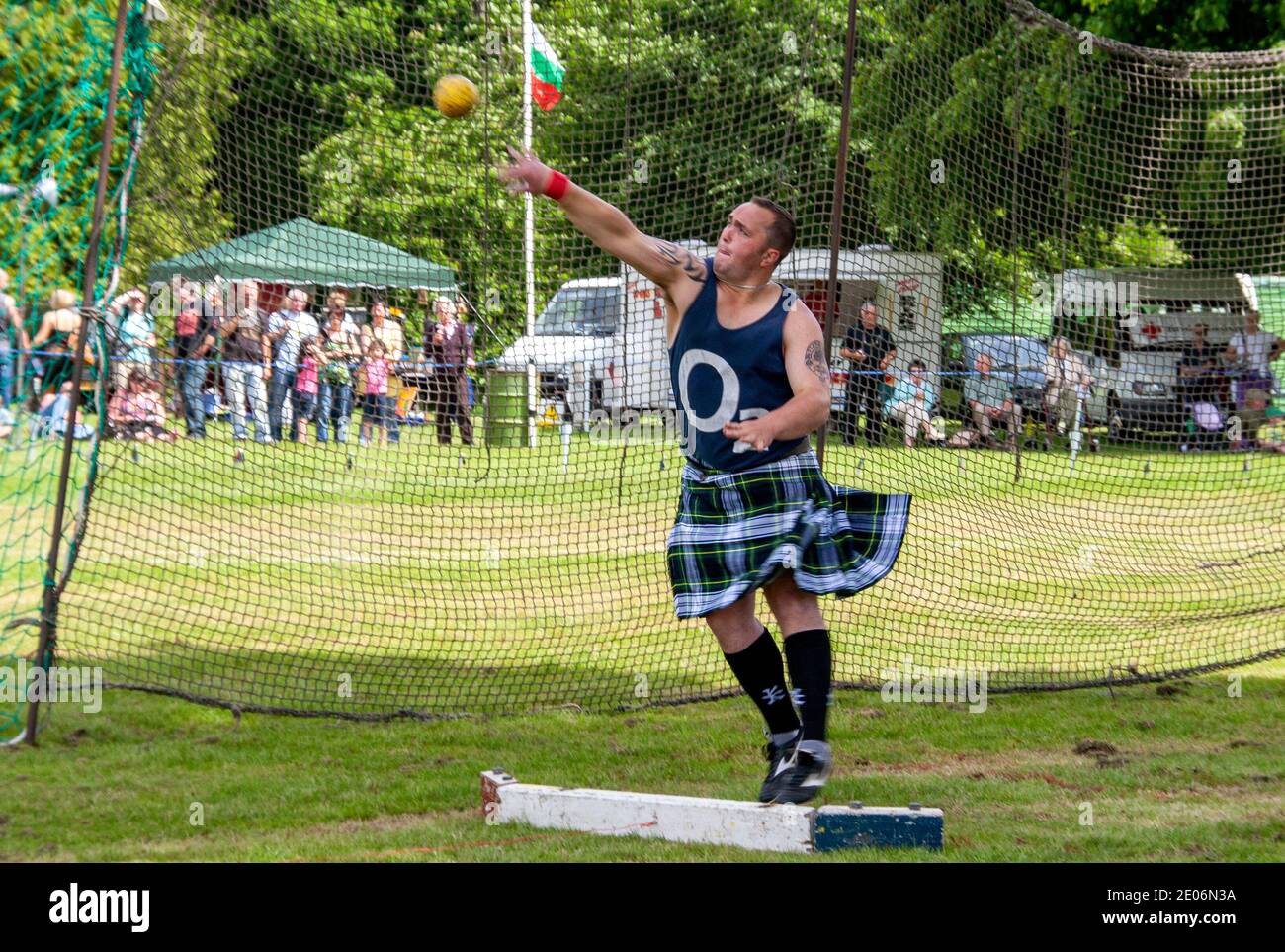 A competitor competing in throwing the Shot Put contest during the 2008 ...