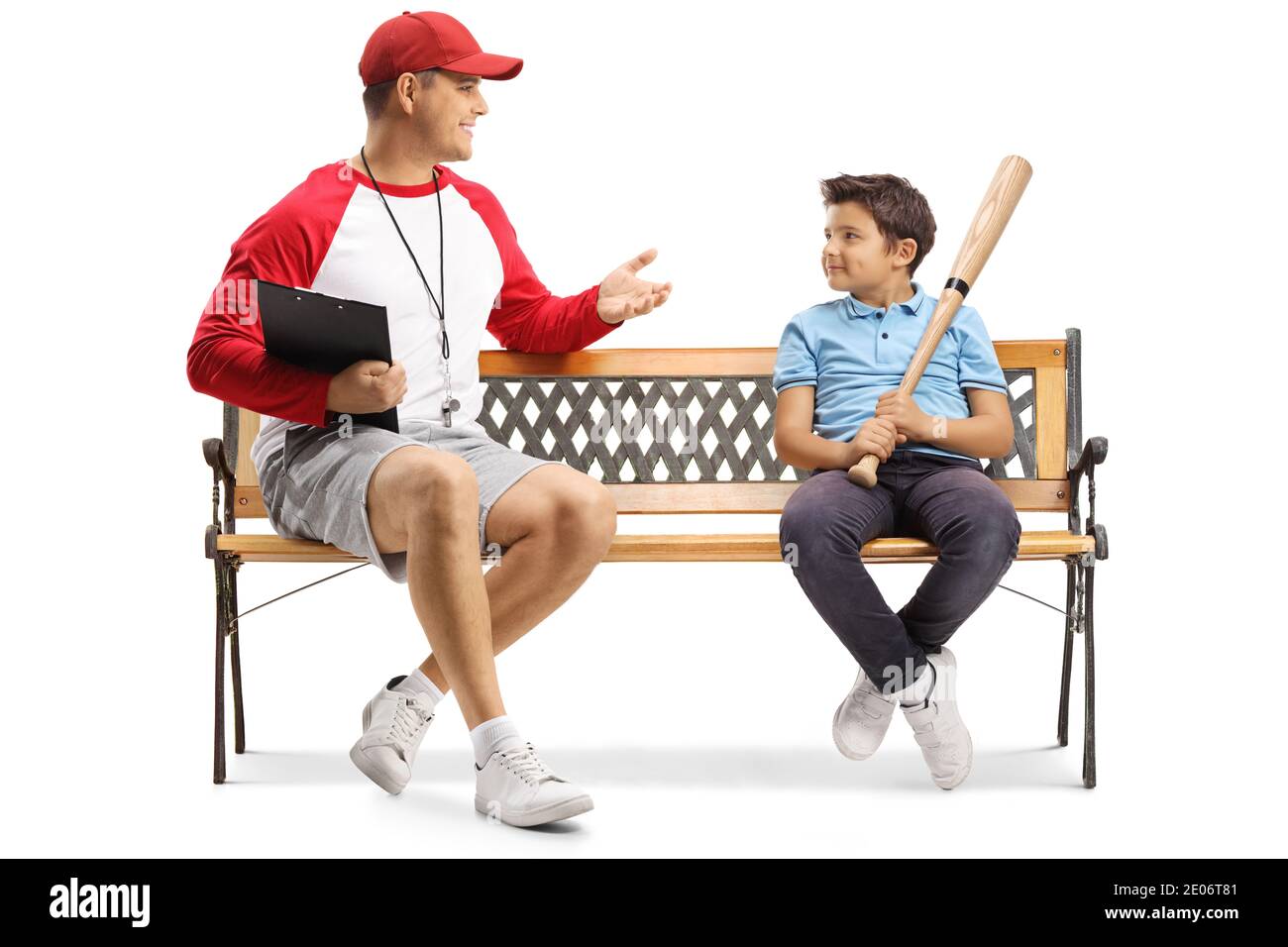 Baseball coach talking to a boy and sitting on a bench isolated on ...