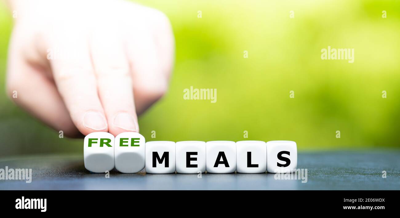 Dice form the expression "free meals Stock Photo - Alamy