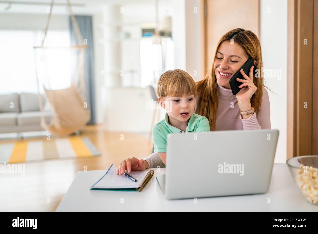 Female mother working home family technology hi-res stock photography ...