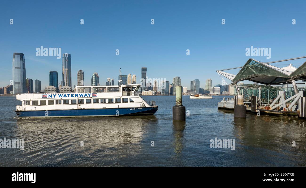 New York, USA, December 2020. NY Waterways passenger ferry approaching ...
