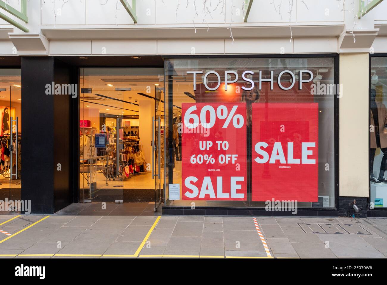Sale posters in a window of clothing retailer Topshop, UK Stock Photo ...