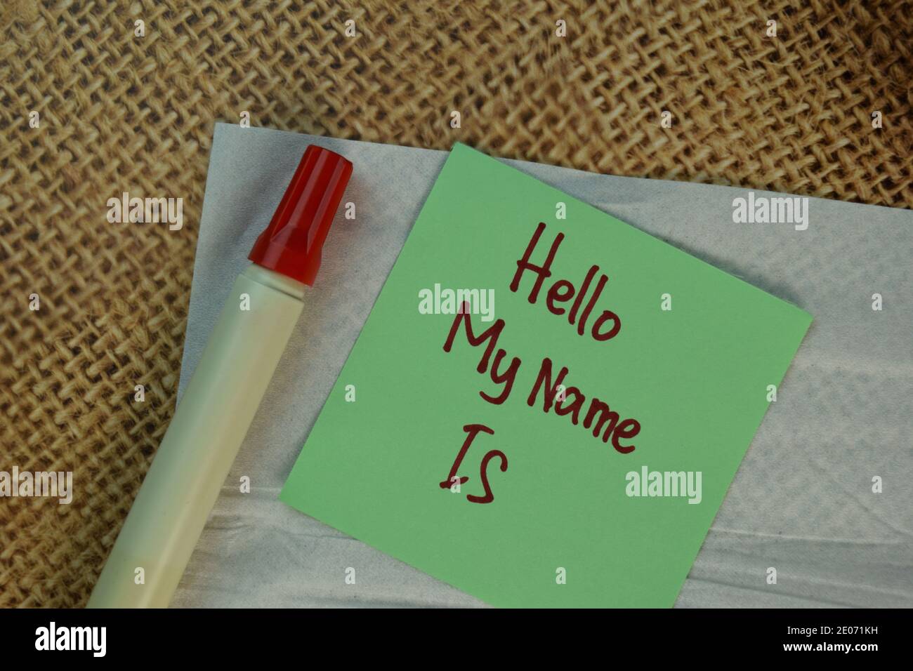 Hello My Name Is write on sticky notes isolated on Brown burlap laying ...