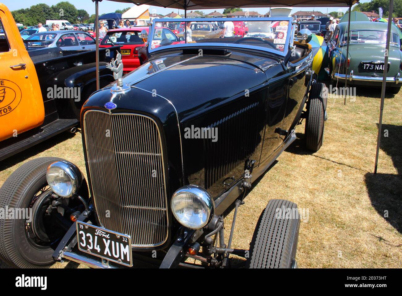 Black Ford hot rod convertible roadster with an car mascot ornament of ...