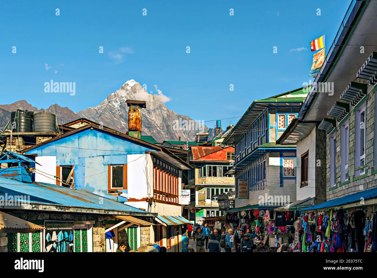 Lukla, Nepal - Nov 09, 2020: Tourists shopping in the street in Lukla ...