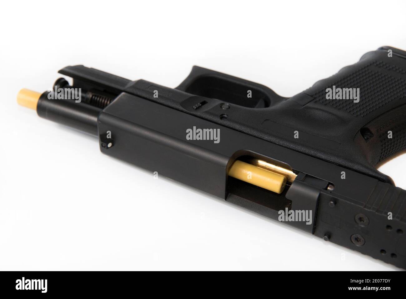 Closeup of a loaded pistol with a safety rod inside preventing shooting ...