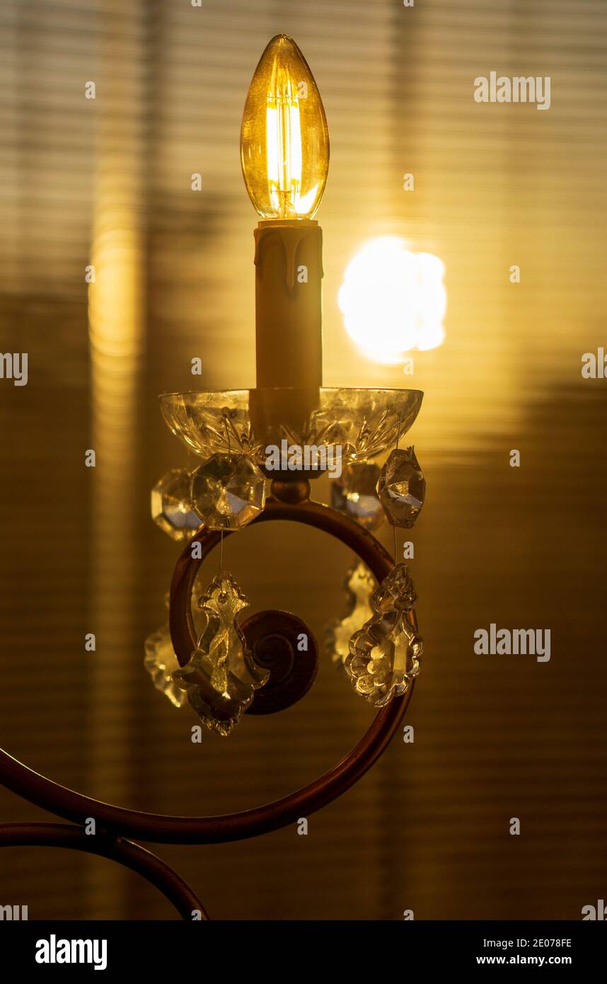 Golden Sun Light Chandelier Bronze and Glass Stock Photo - Alamy